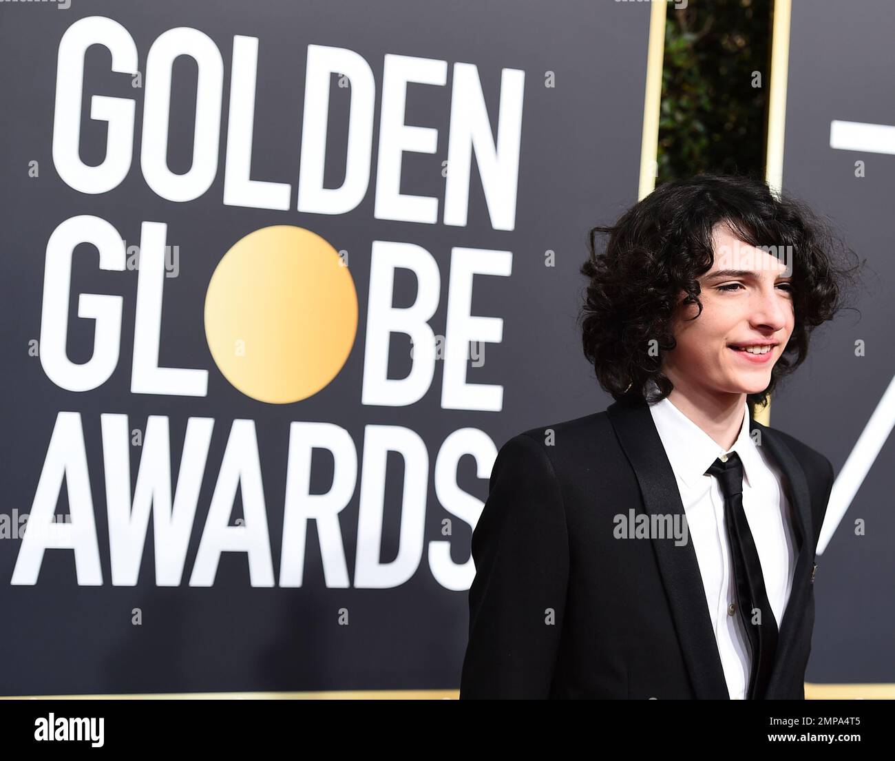 Finn Wolfhard arrives at the 75th annual Golden Globe Awards at the ...