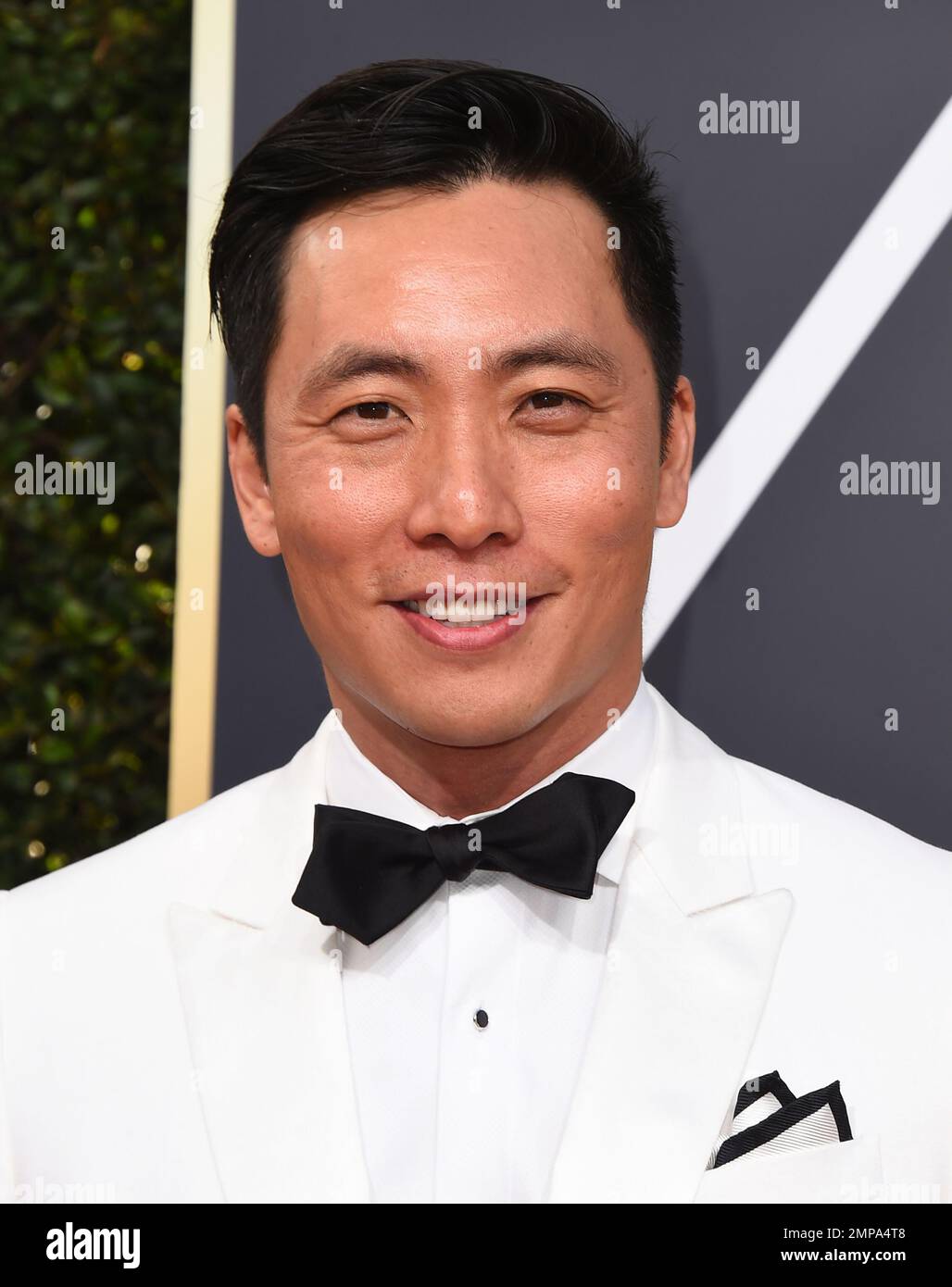 Kelvin Yu arrives at the 75th annual Golden Globe Awards at the Beverly ...