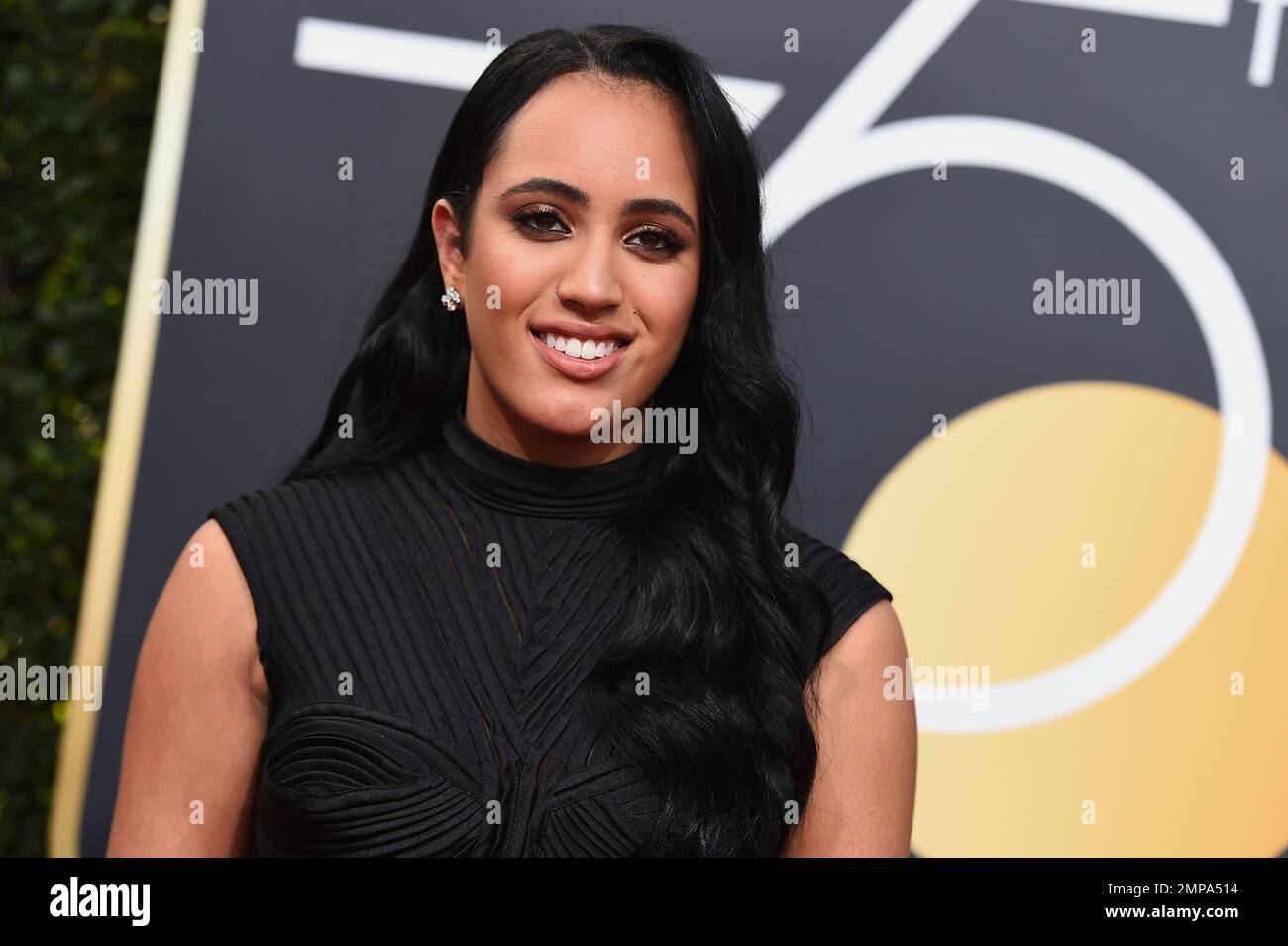 Simone Garcia Johnson arrives at the 75th annual Golden Globe Awards at ...
