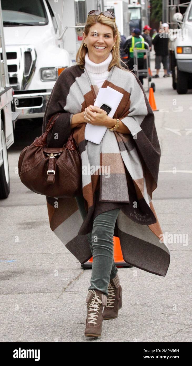 Lori Loughlin is all smiles as she arrives on the set of the teen drama ...