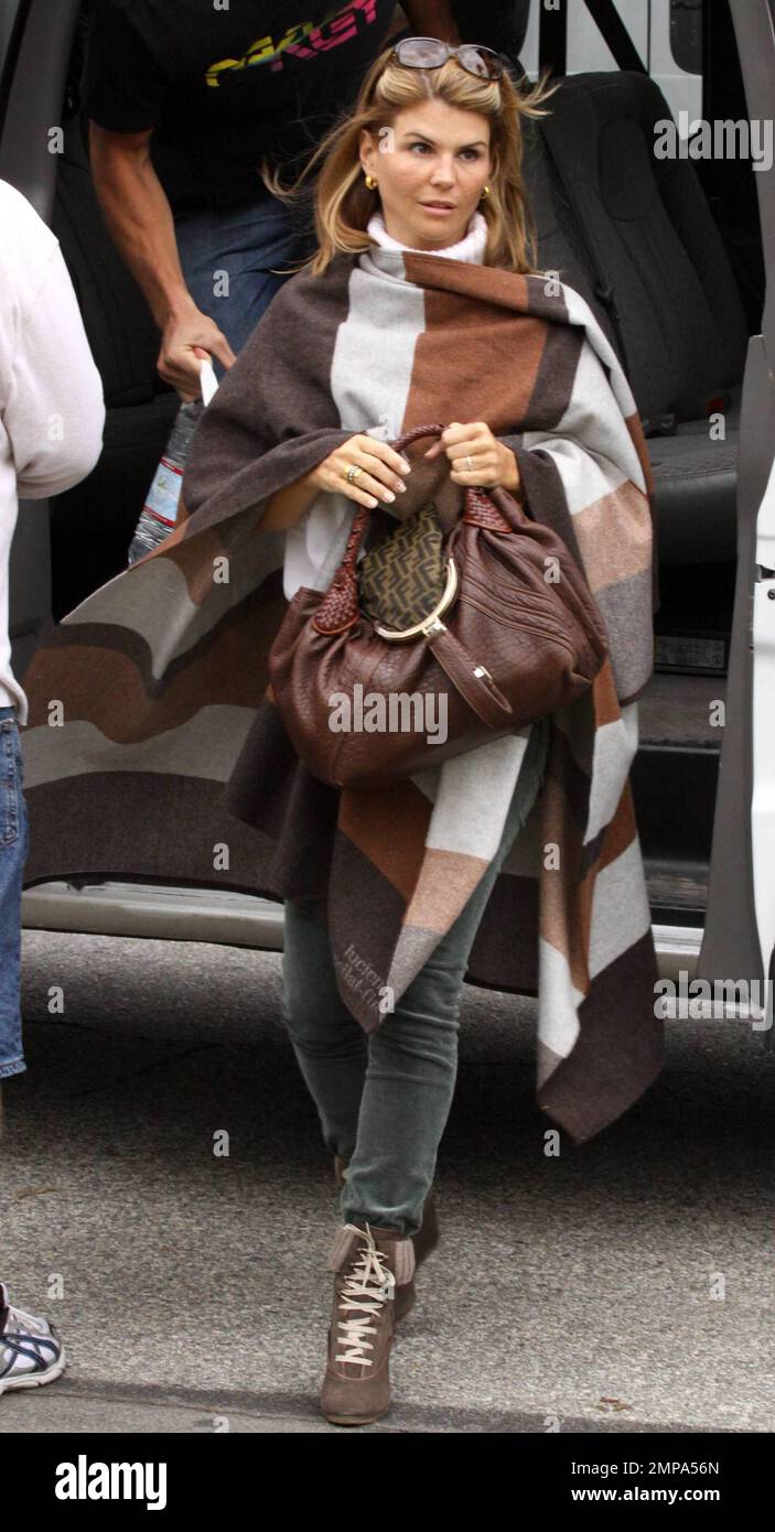 Lori Loughlin is all smiles as she arrives on the set of the teen drama ...