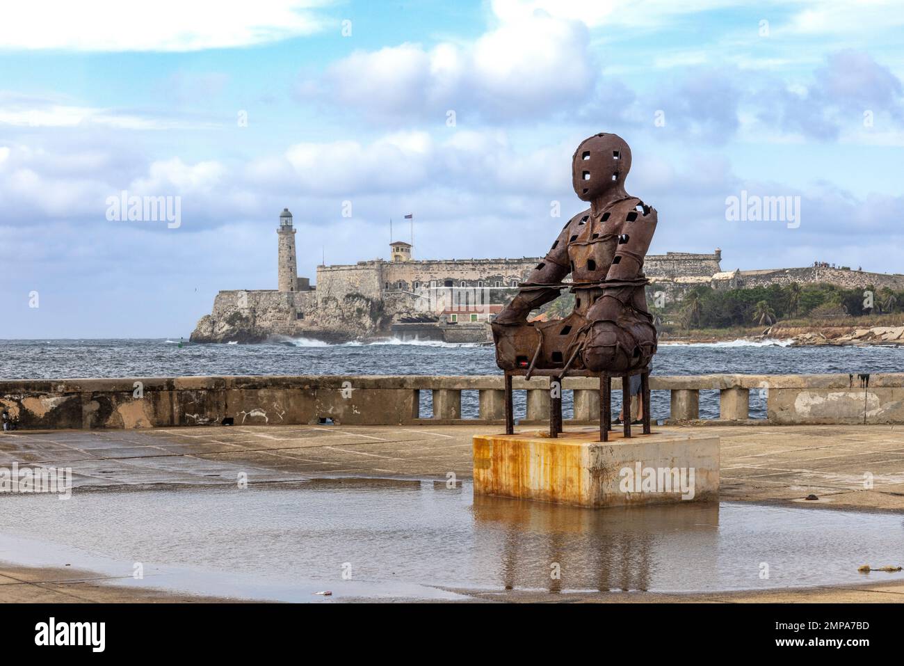Sculpture on promenade and Castle of the Three Kings of Morro, Old ...