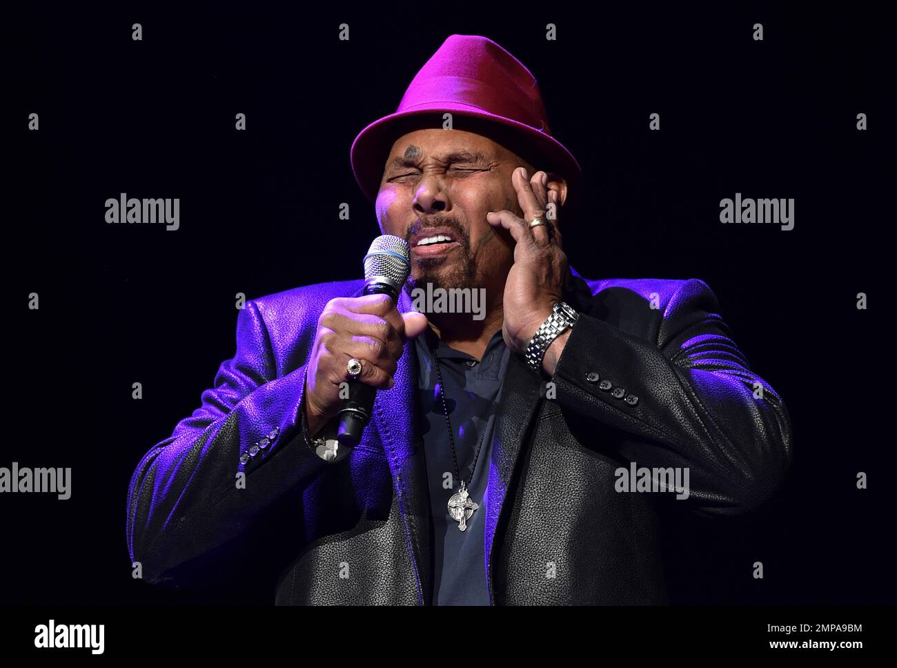 Singer Aaron Neville performs during A Concert For Island Relief at ...