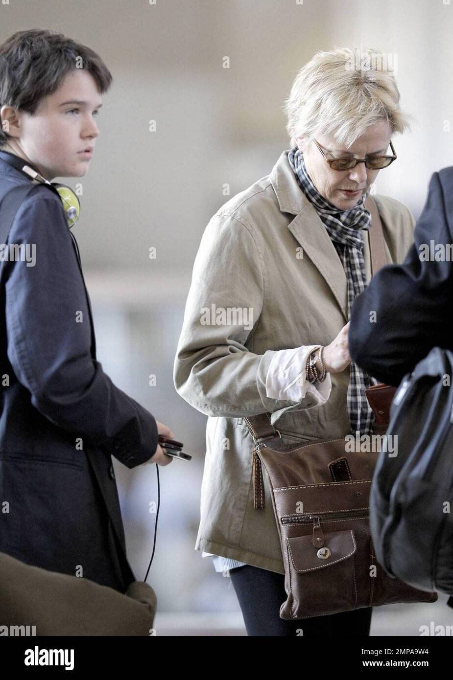 Annette Bening and her son Benjamin arrive at LAX and after checking in ...