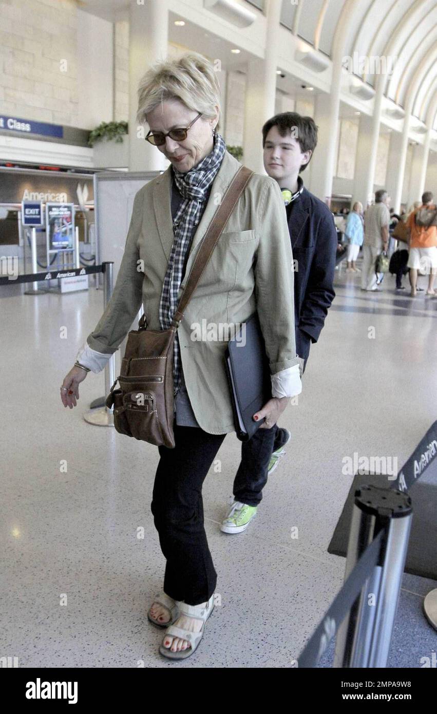 Annette Bening and her son Benjamin arrive at LAX and after checking in ...