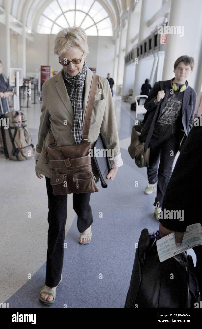 Annette Bening and her son Benjamin arrive at LAX and after checking in ...