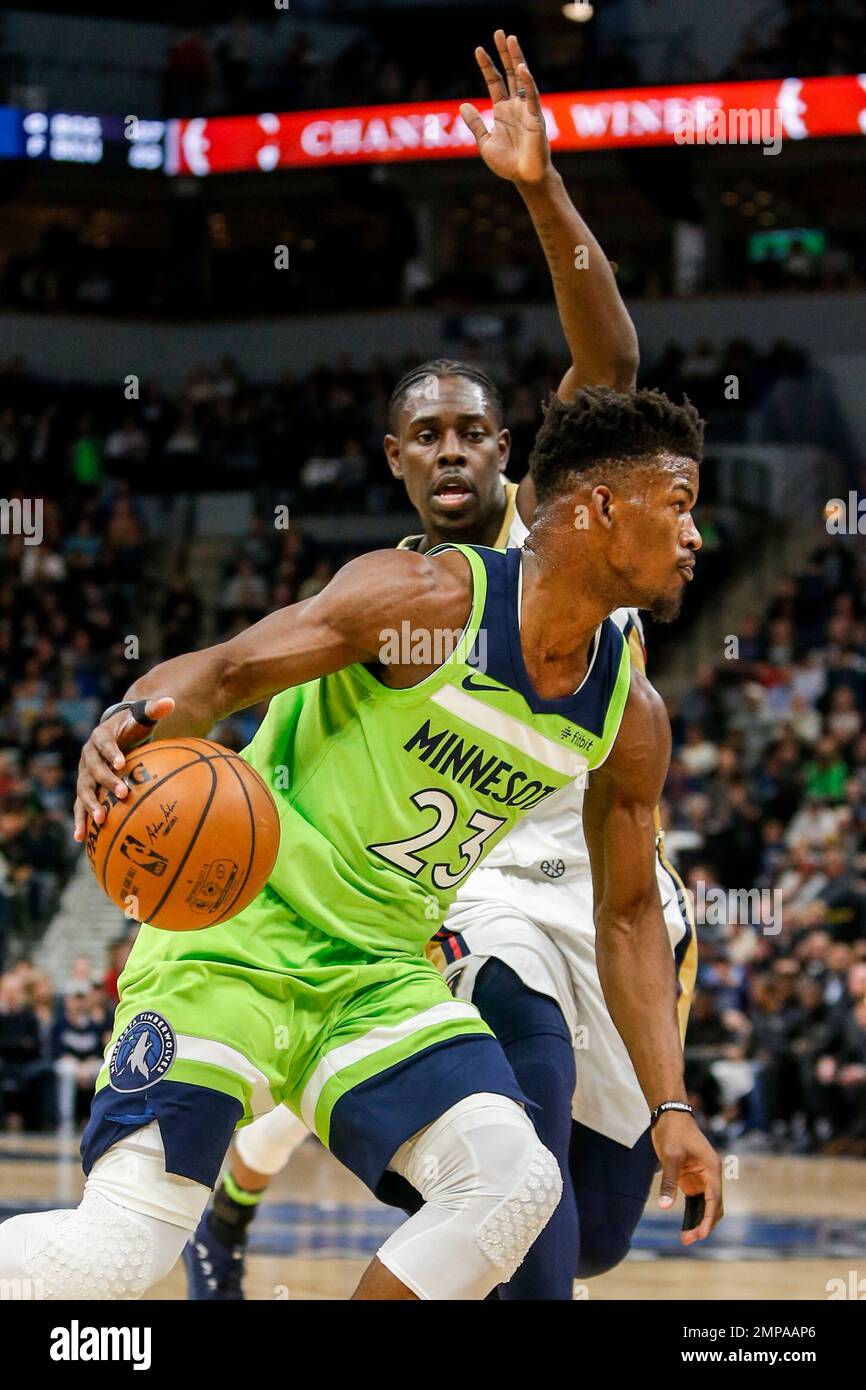 Minnesota Timberwolves forward Jimmy Butler (23) drives around New ...