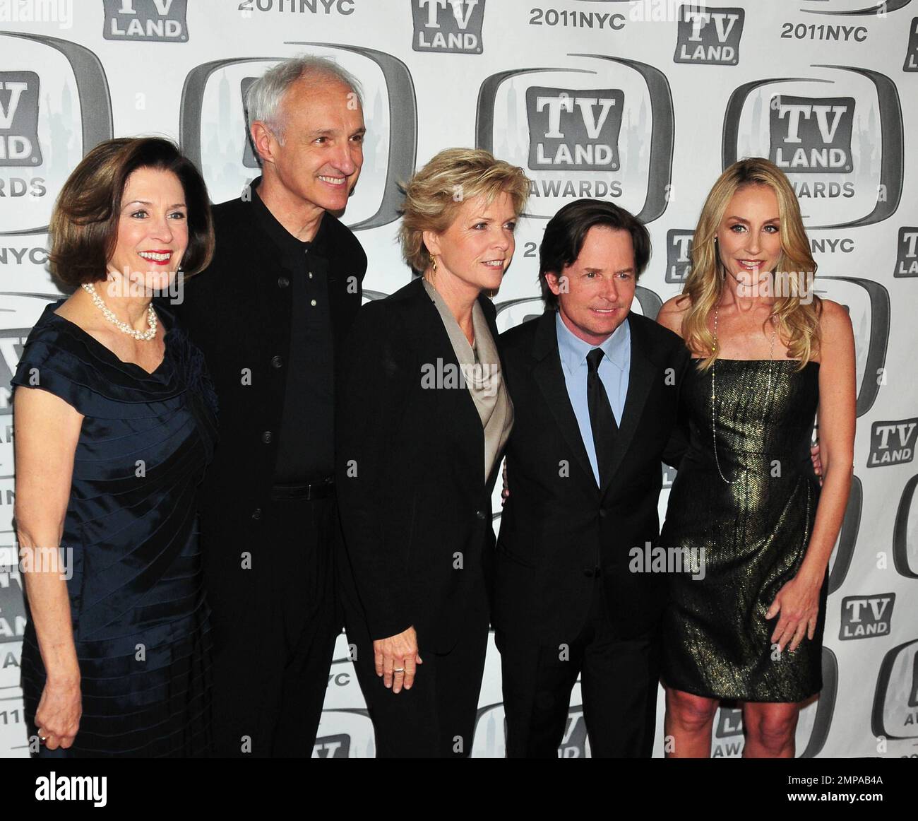 Michael Gross, Meredith Baxter, Michael J Fox and Tracy Pollan pose on ...