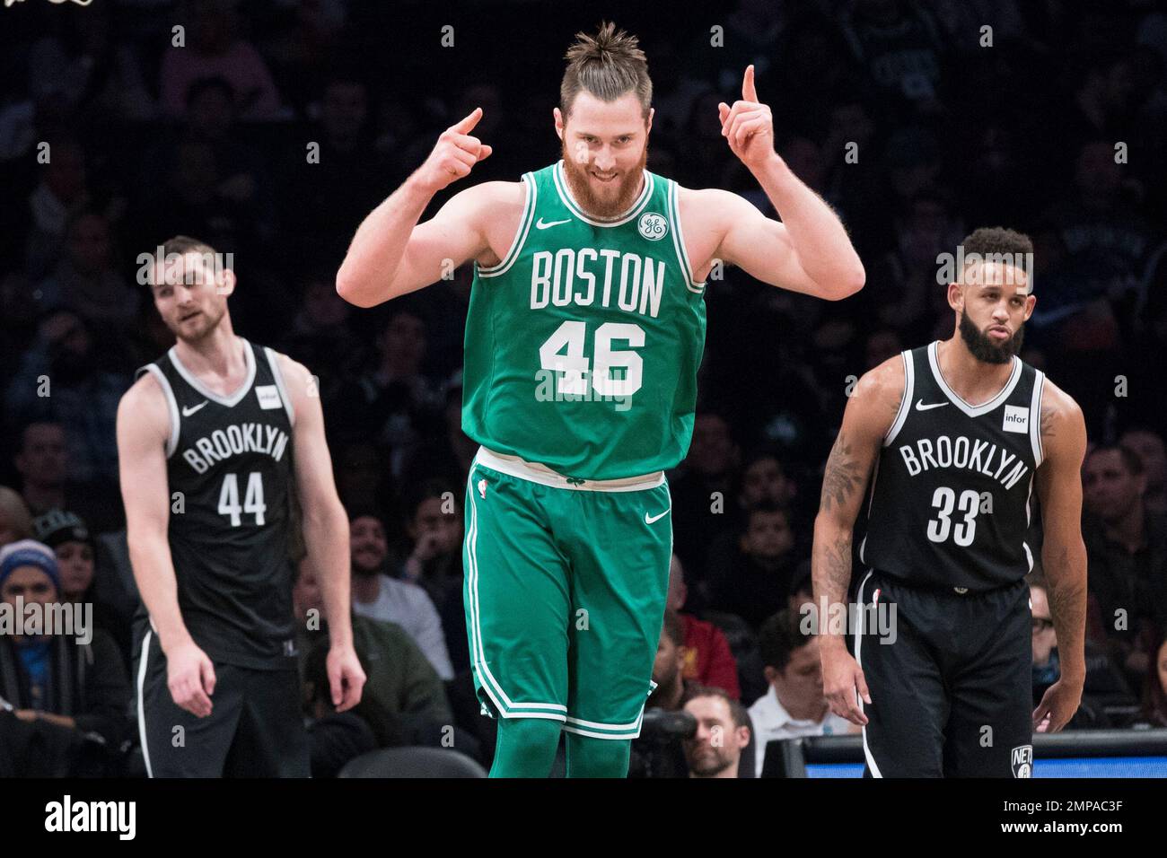 Boston Celtics center Aron Baynes (46) and Brooklyn Nets center Tyler ...