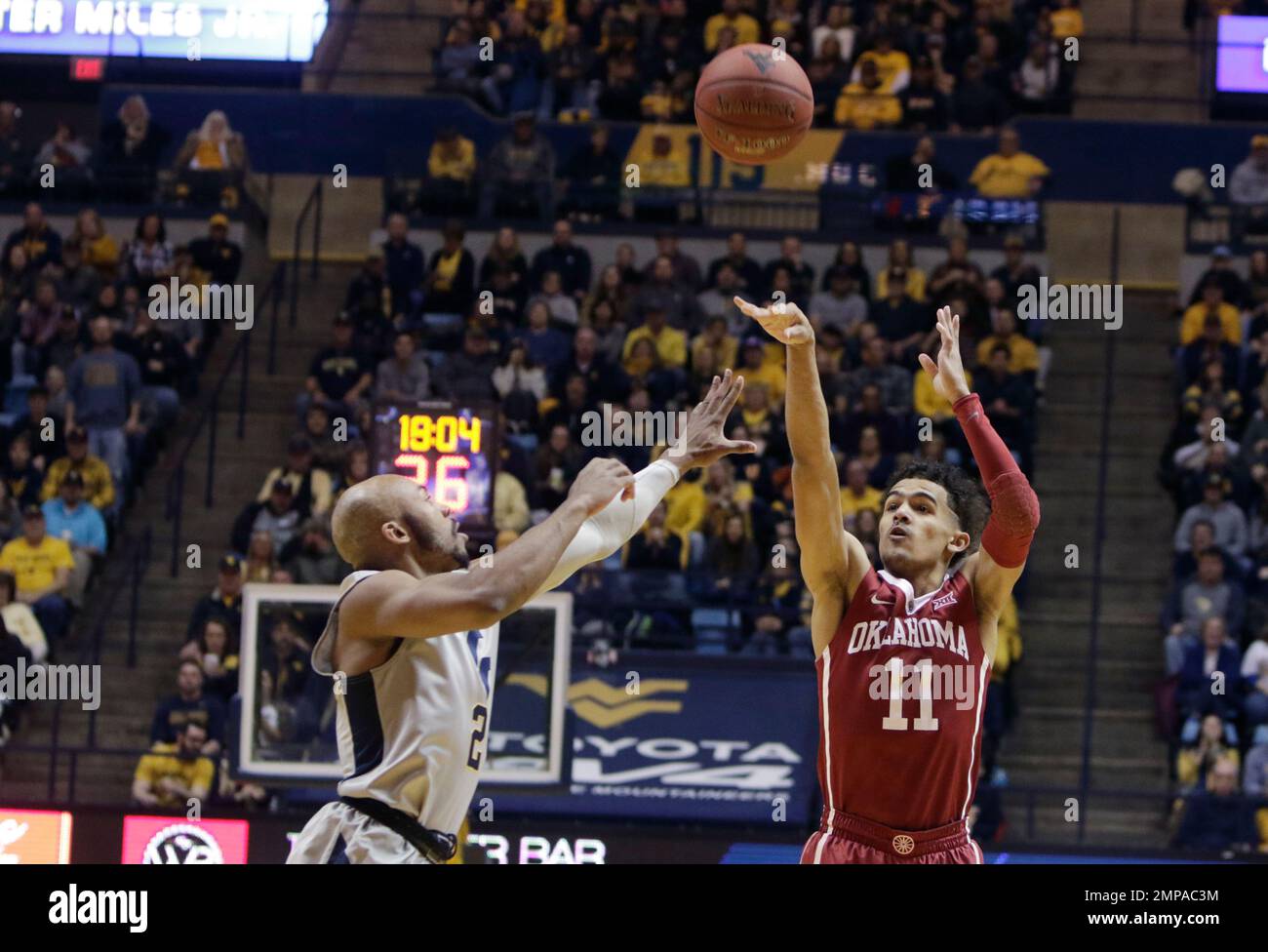 Oklahoma guard Trae Young (11) shoots while being defended by West ...