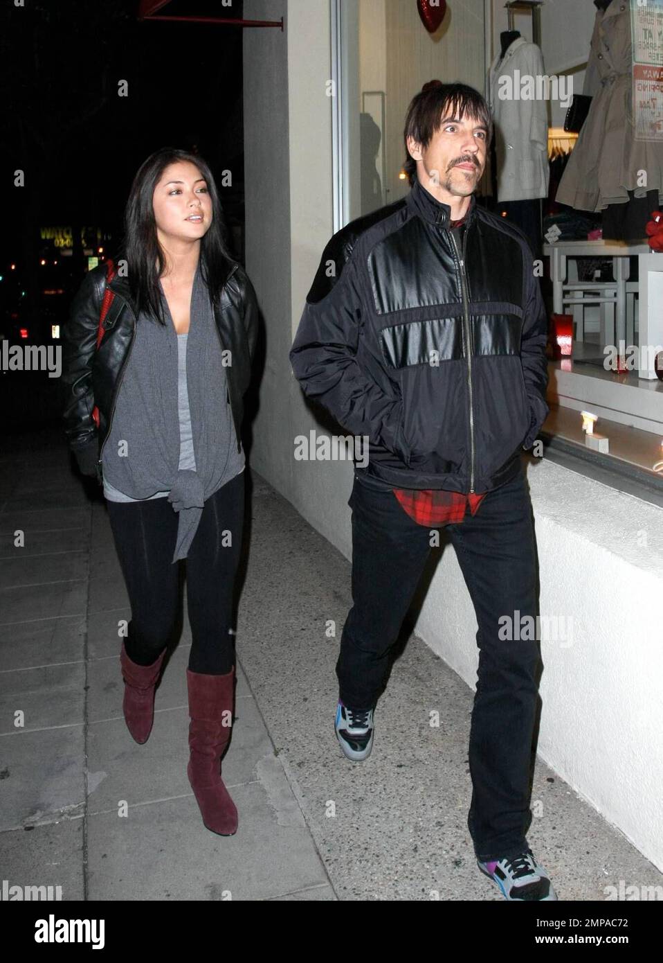 Red Hot Chili Pepper Anthony Keidis and a female friend head out for a ...