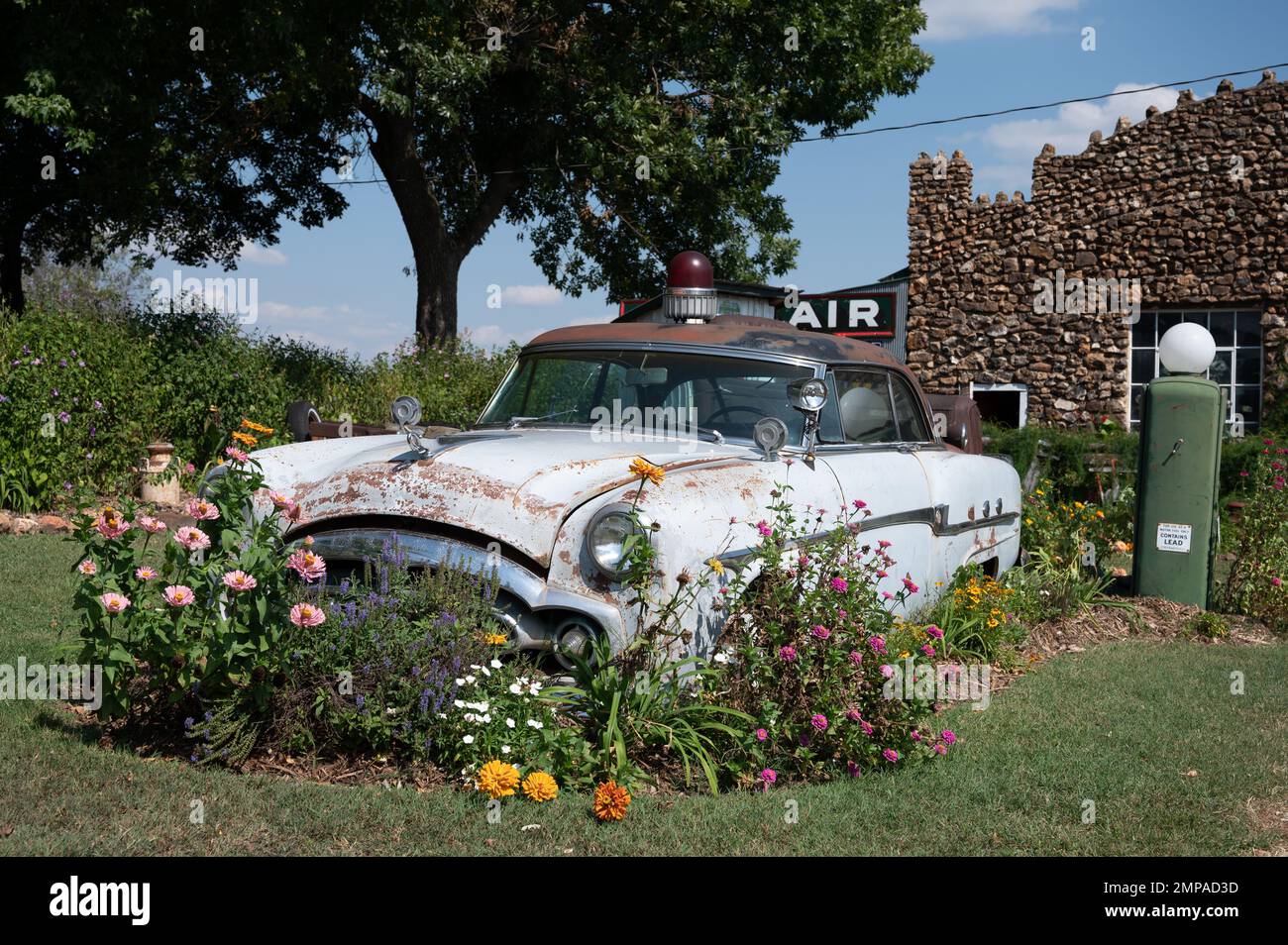A detail of an old white Packard Mayfair classic car abandoned in the ...
