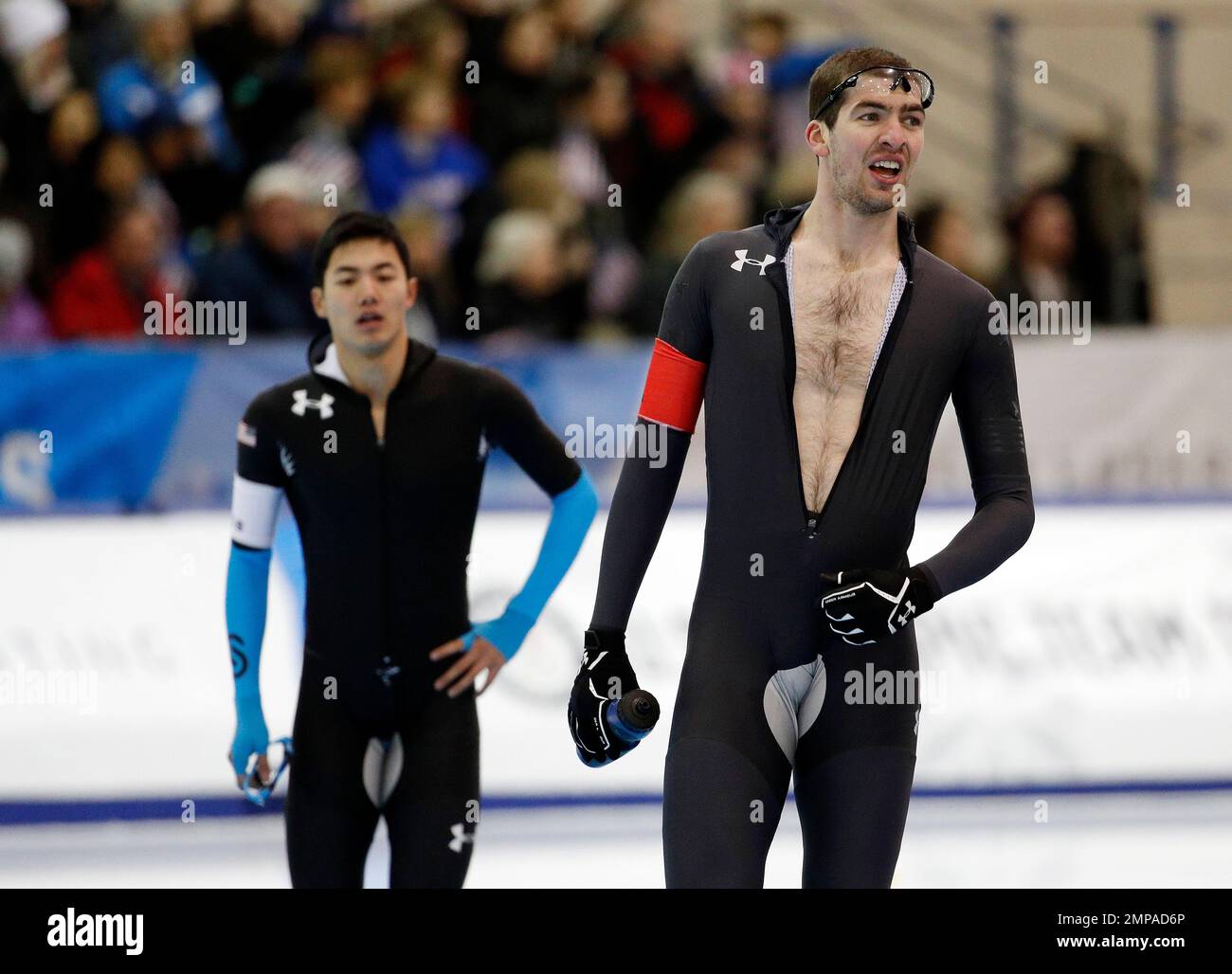 Steven Hartman, right, and Edwin Park react after competing in the men ...
