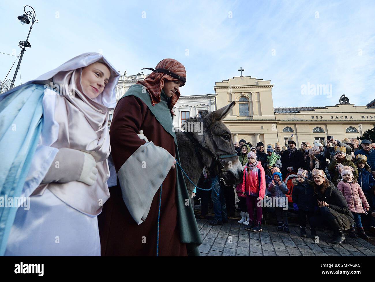 Actors representing Mary and Joseph walk in Warsaw's annual Epiphany ...
