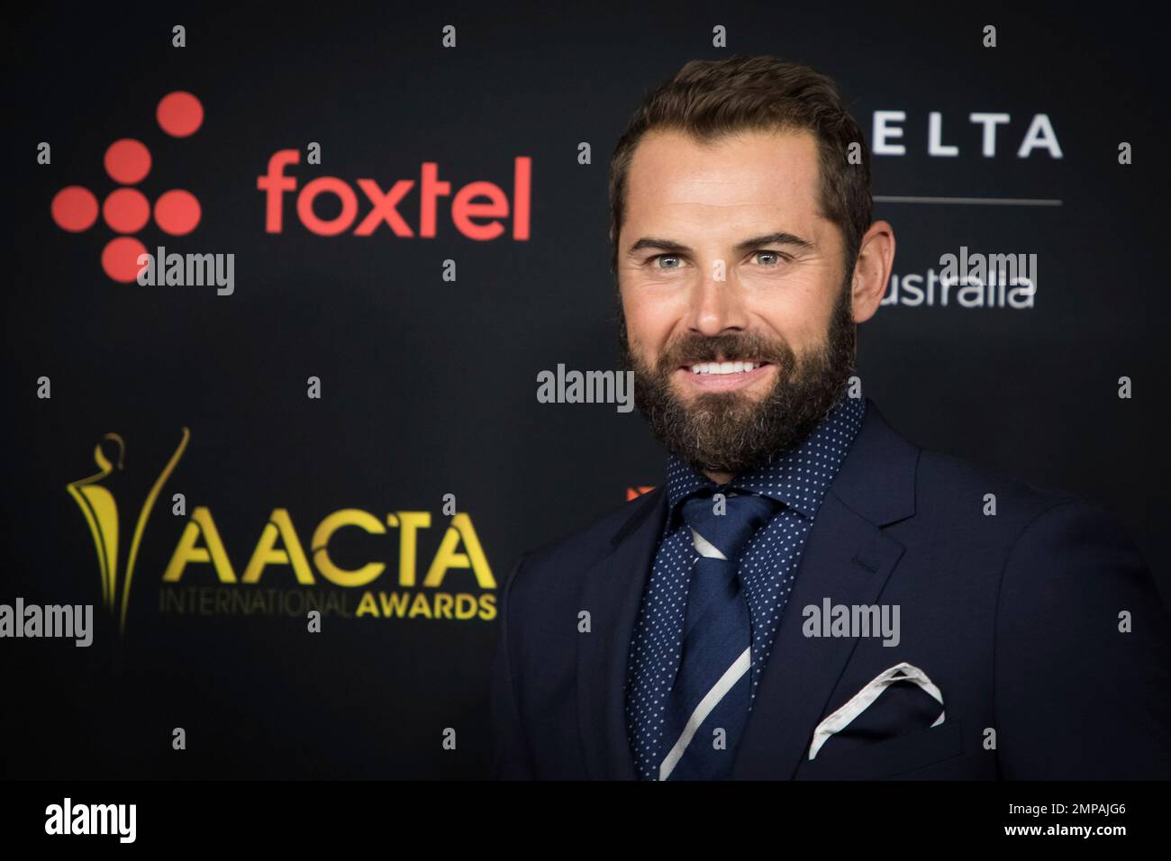 Daniel MacPherson poses for photographers upon arrival at the 7th ...