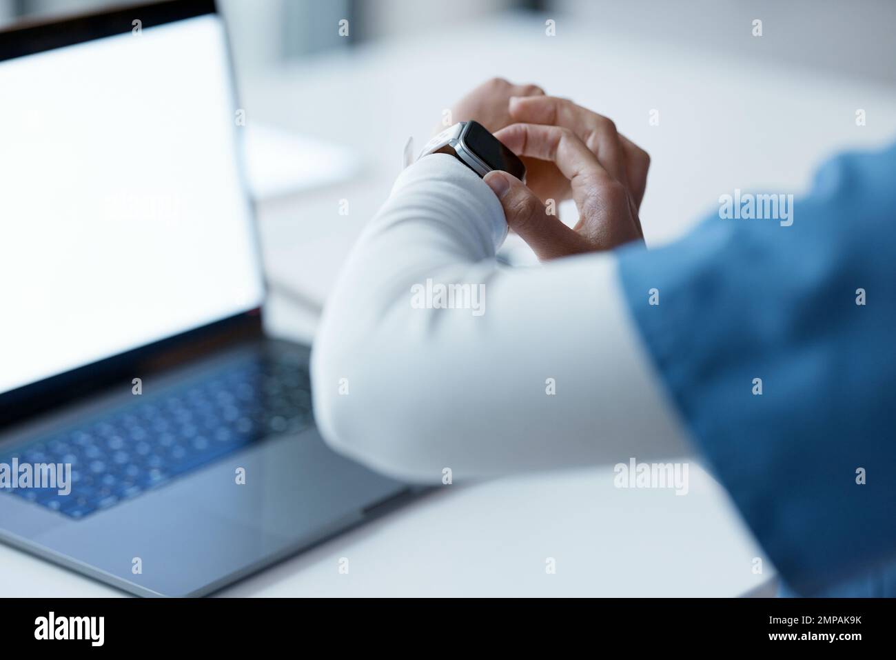 Watch, healthcare and time with a woman nurse working late at night on ...