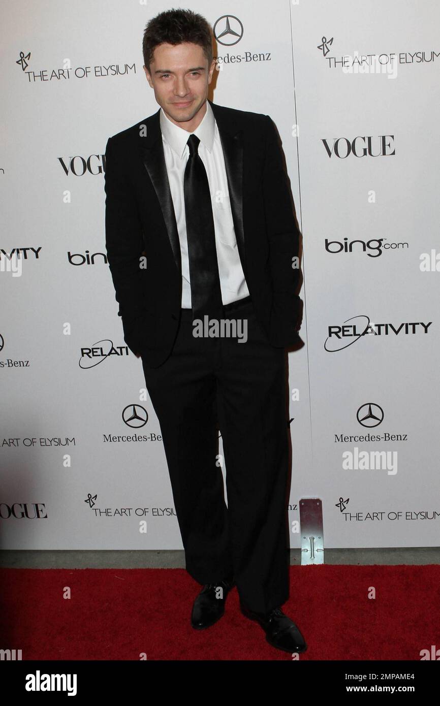 Topher Grace on the red carpet at the star studded Art of Elysium ...