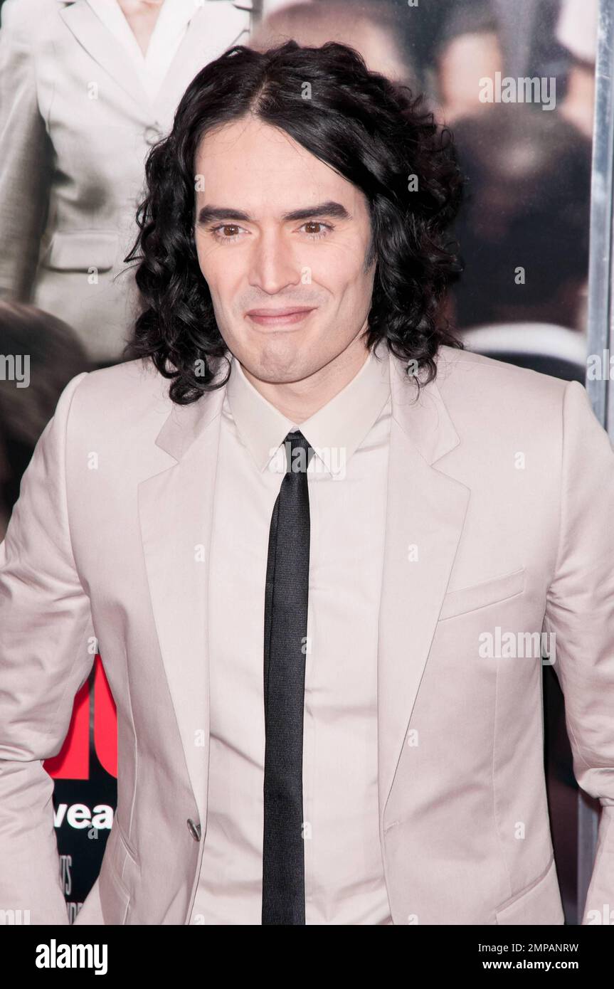 Russell Brand walks the red carpet at the premiere of "Arthur", a ...