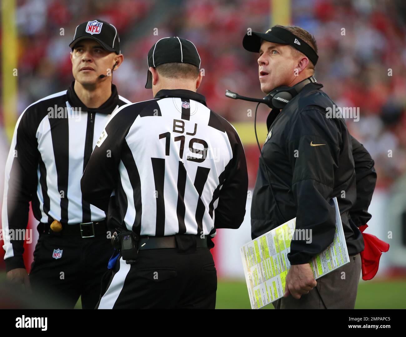 New Orleans Saints head coach Sean Payton talks with officials during a ...