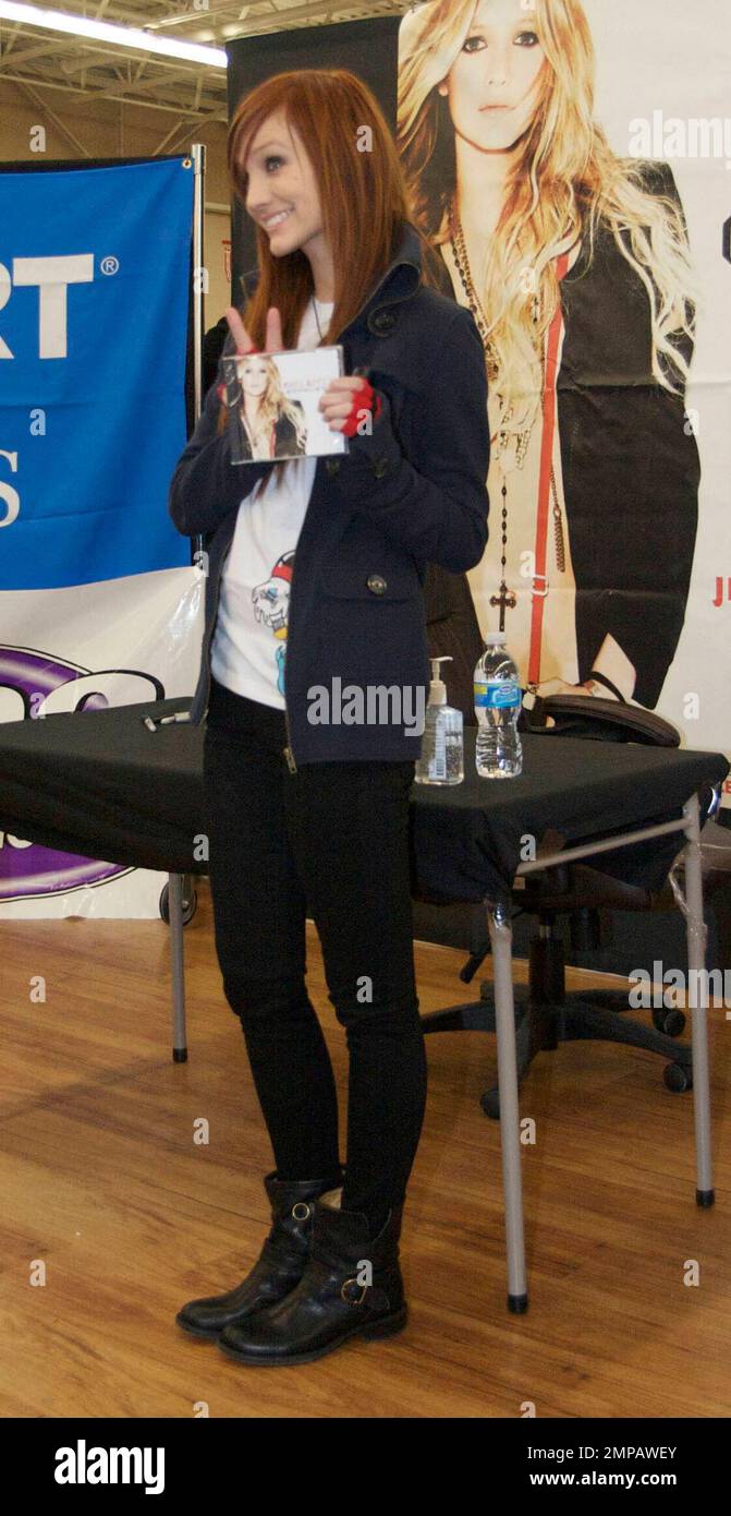 Singer Ashlee Simpson meets and greets fans during a CD signing of her ...