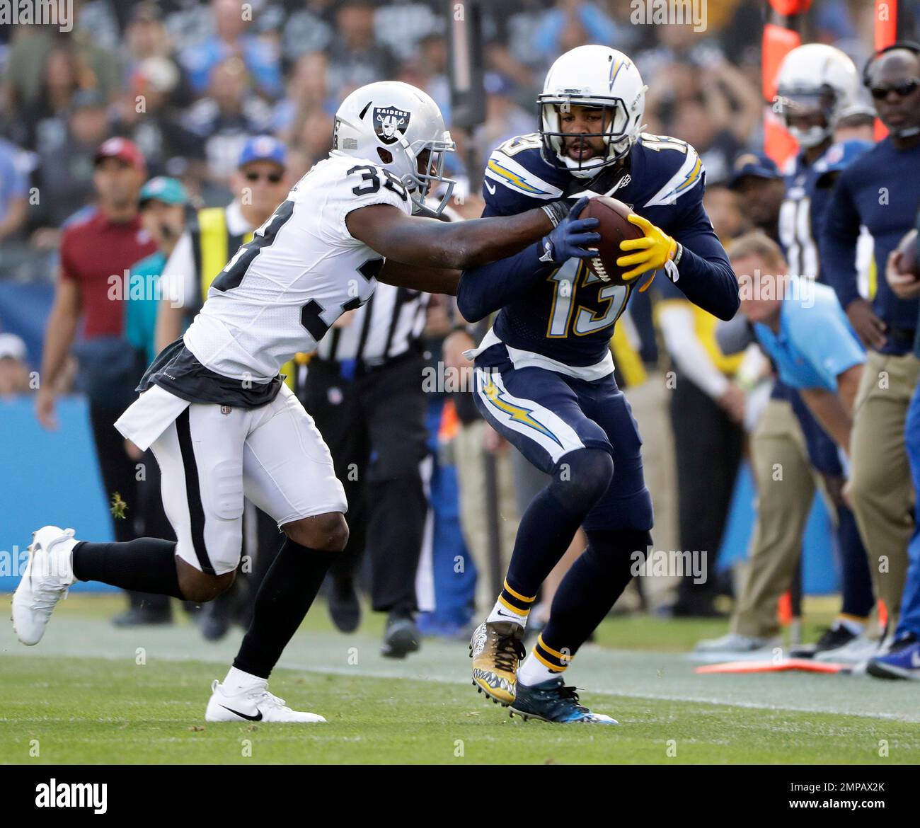 Oakland Raiders cornerback T.J. Carrie (38) closes in on Los Angeles ...