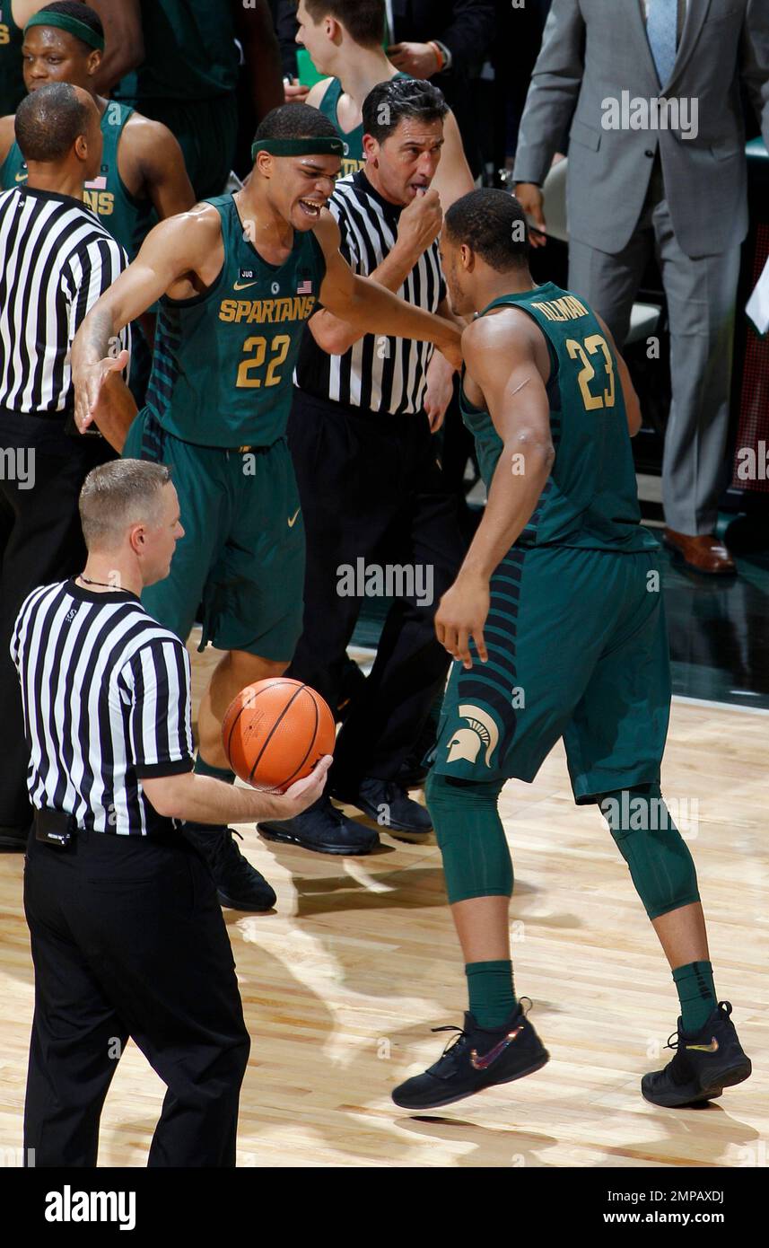 Michigan State's Miles Bridges, left, and Xavier Tillman (23) celebrate ...