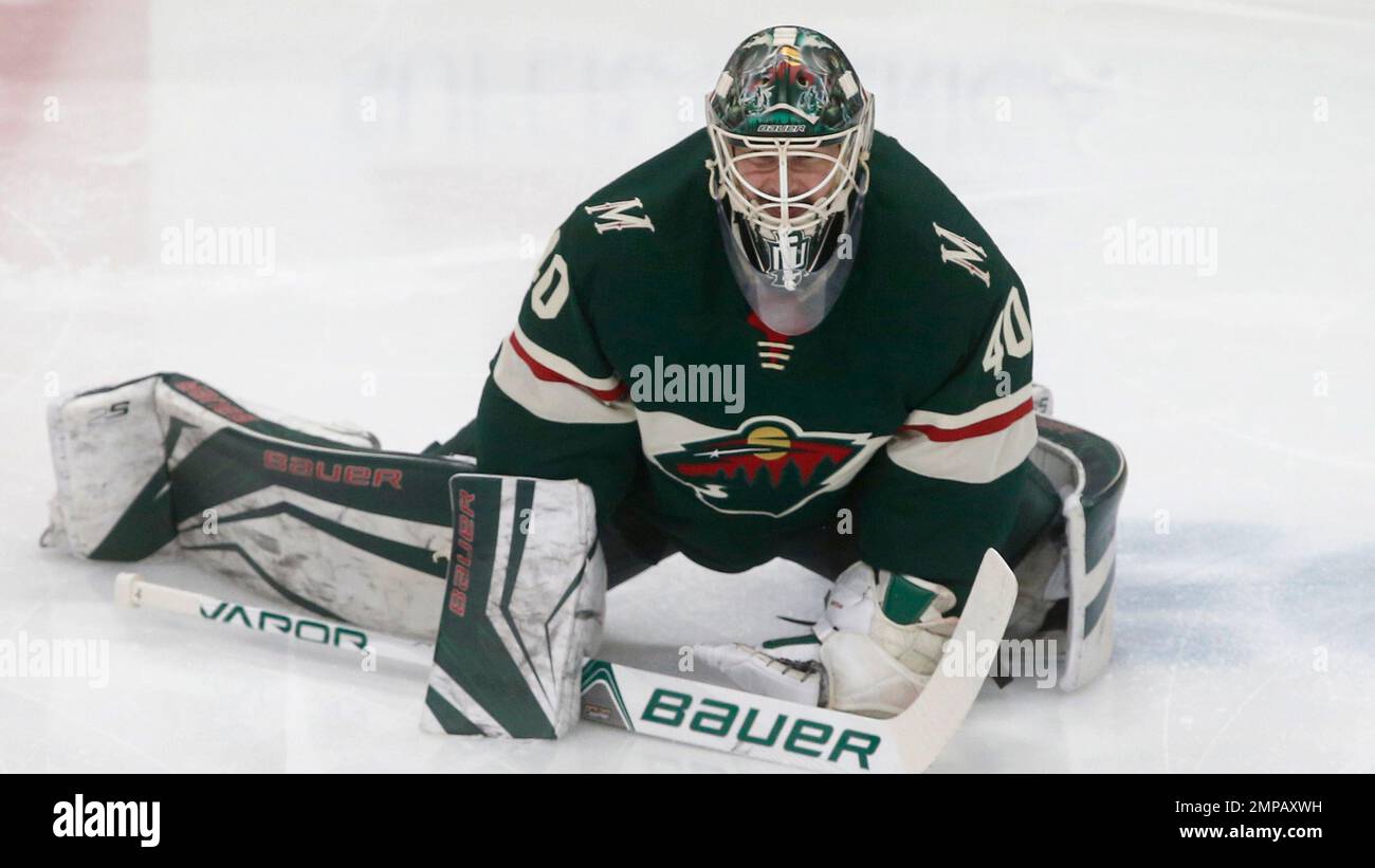 Minnesota Wild goalie Devan Dubnyk stretches before an NHL hockey game ...