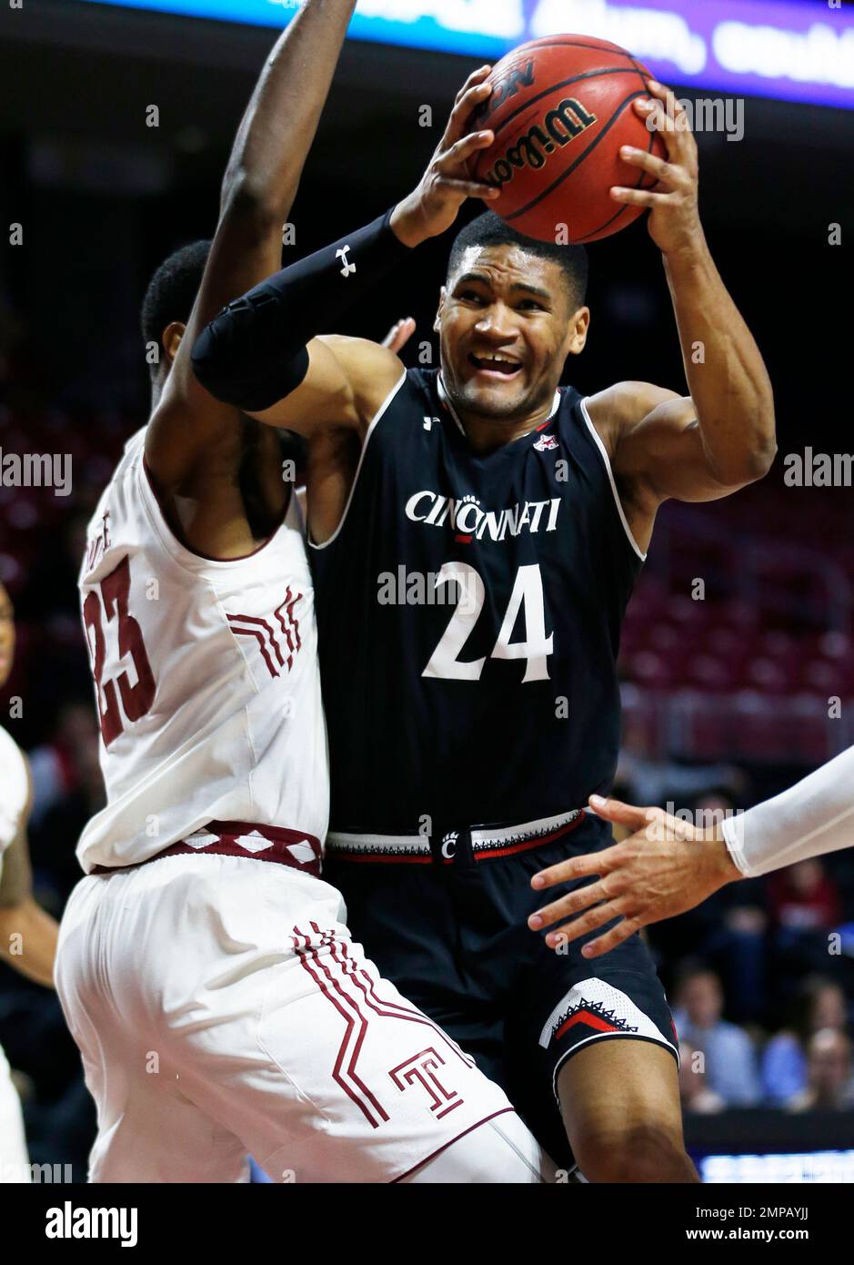 Cincinnati forward Kyle Washington (24) grabs a rebound away from ...