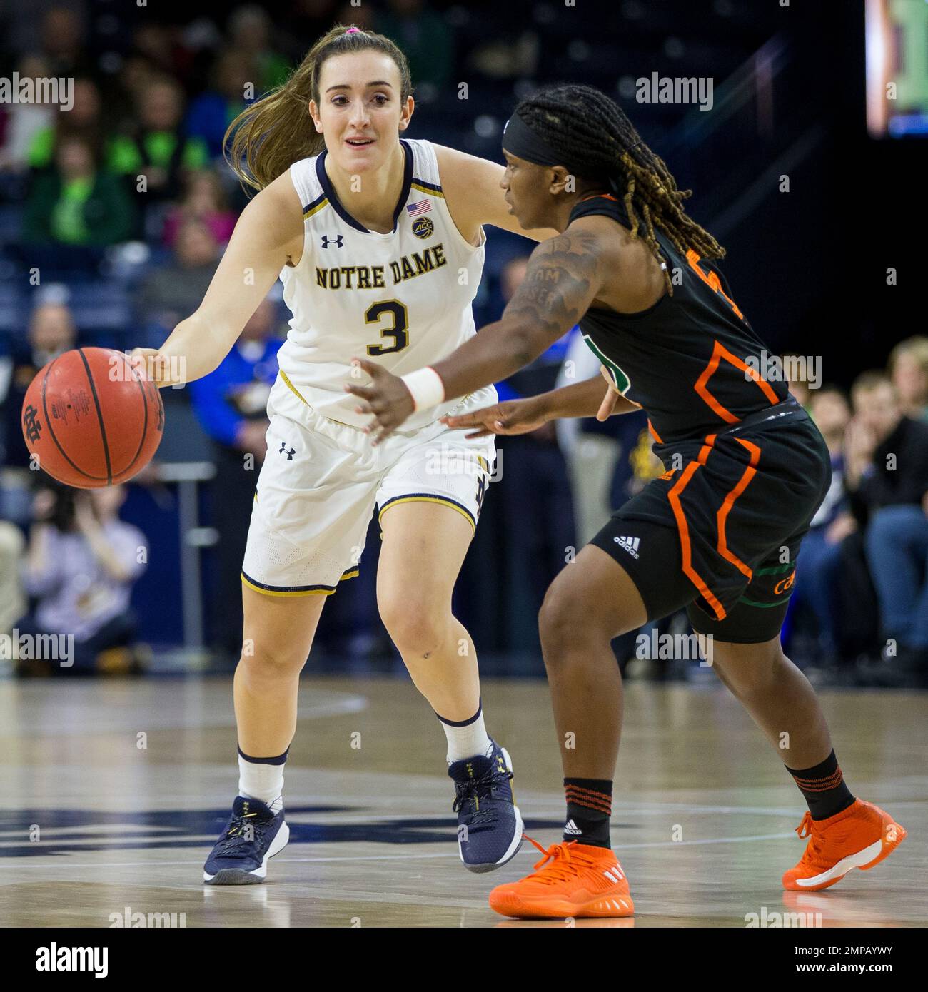 Notre Dame's Marina Mabrey (3) drives as Miami's Mykea Gray (5) defends ...