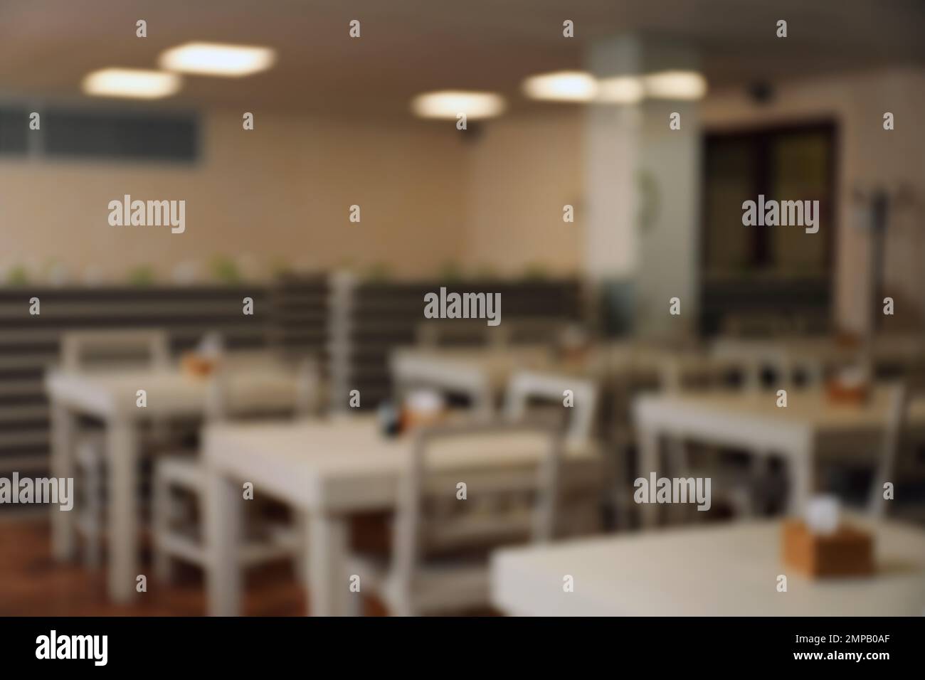 Blurred view of modern school canteen with new furniture Stock Photo ...