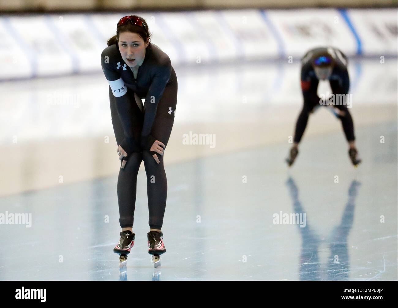 Petra Acker, left, and Maria Lamb react after competing in the women's ...