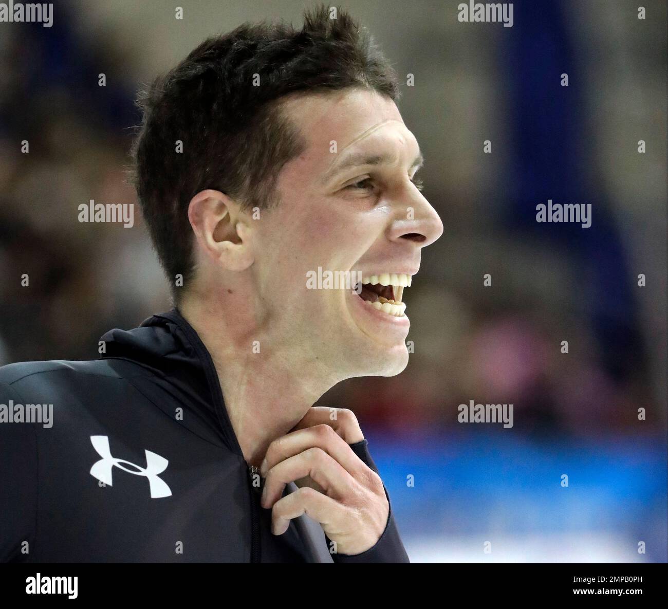 Chase Reichman reacts after competing in the men's 10,000 meters during ...