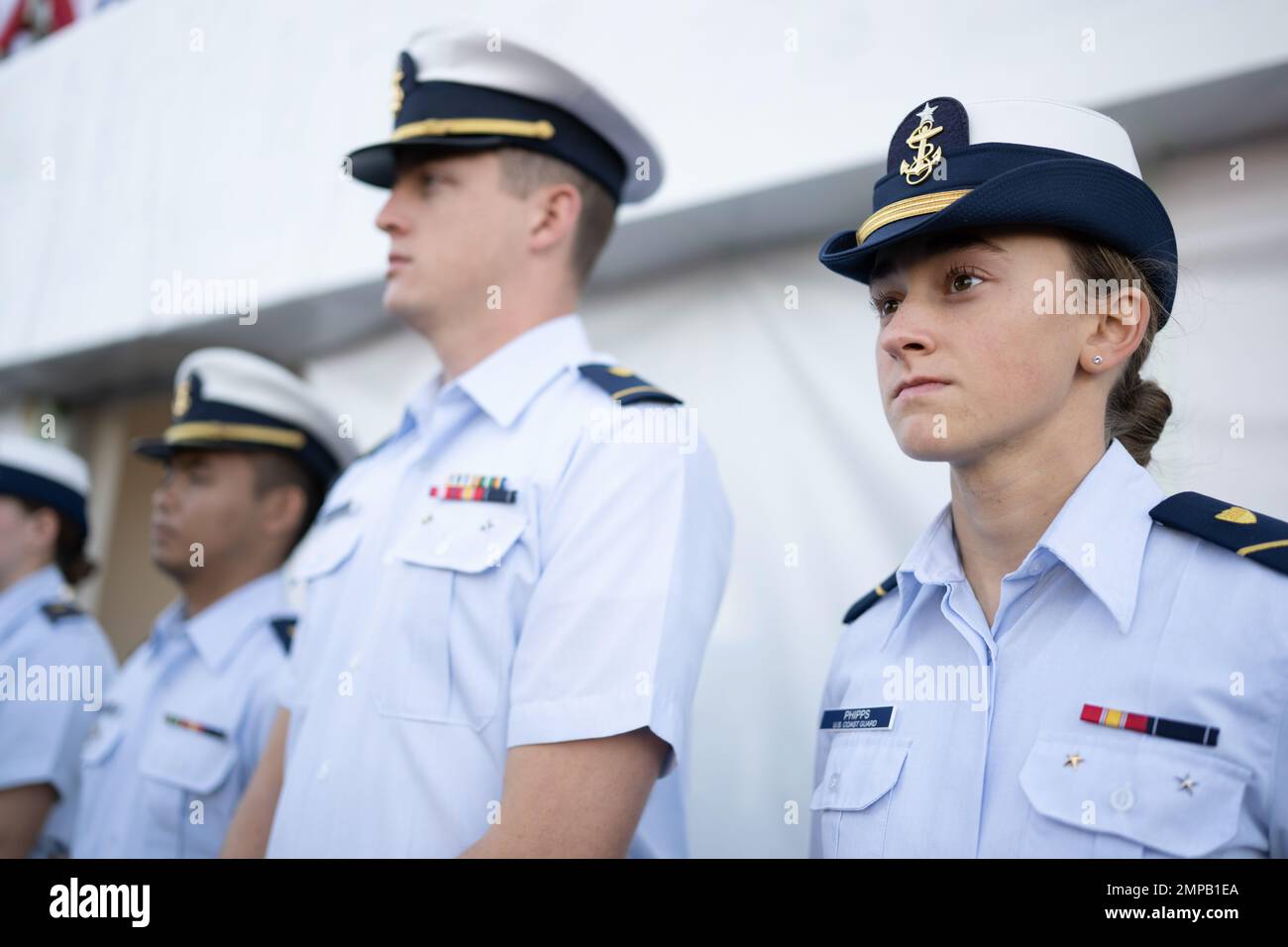 Cadets stand at parade rest during the commissioning ceremony of the ...