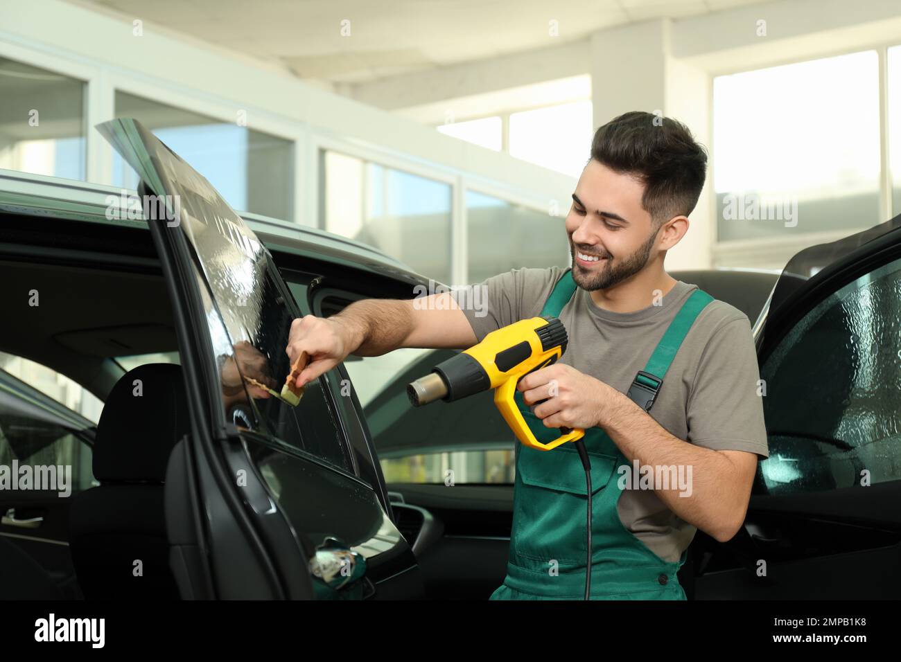 Heat gun window tinting hi-res stock photography and images - Alamy
