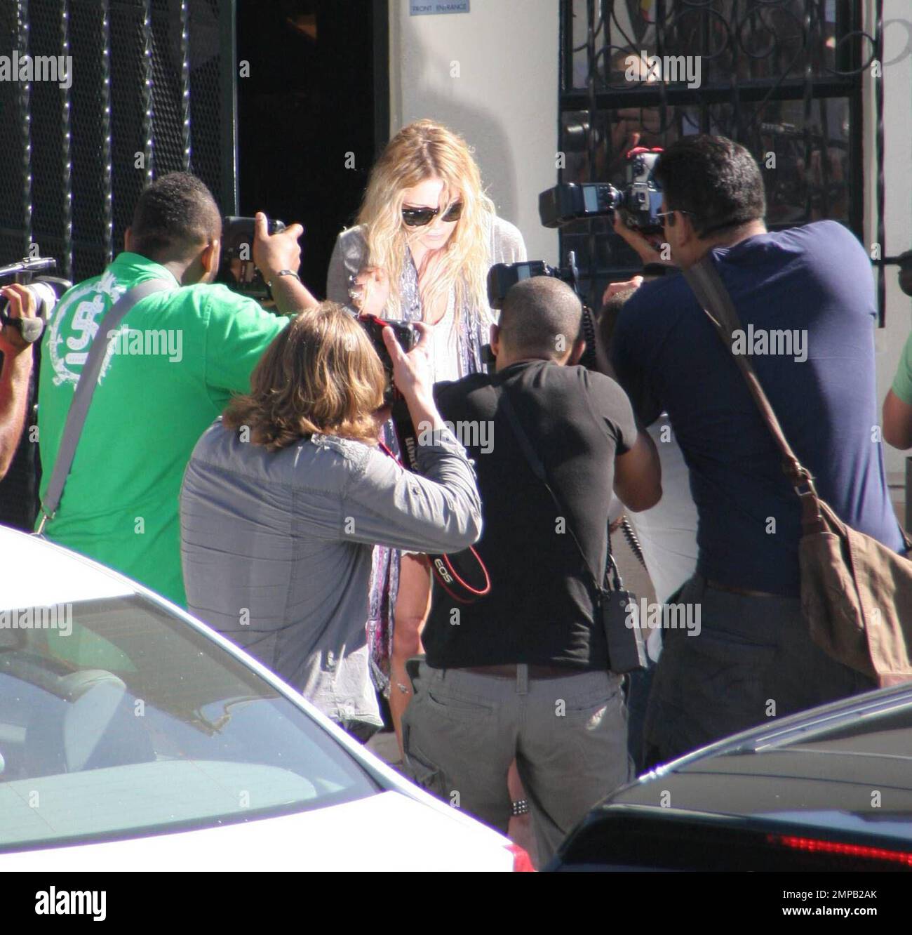 Ashley Olsen shops at the boutique store Tracey Ross wearing lots of ...