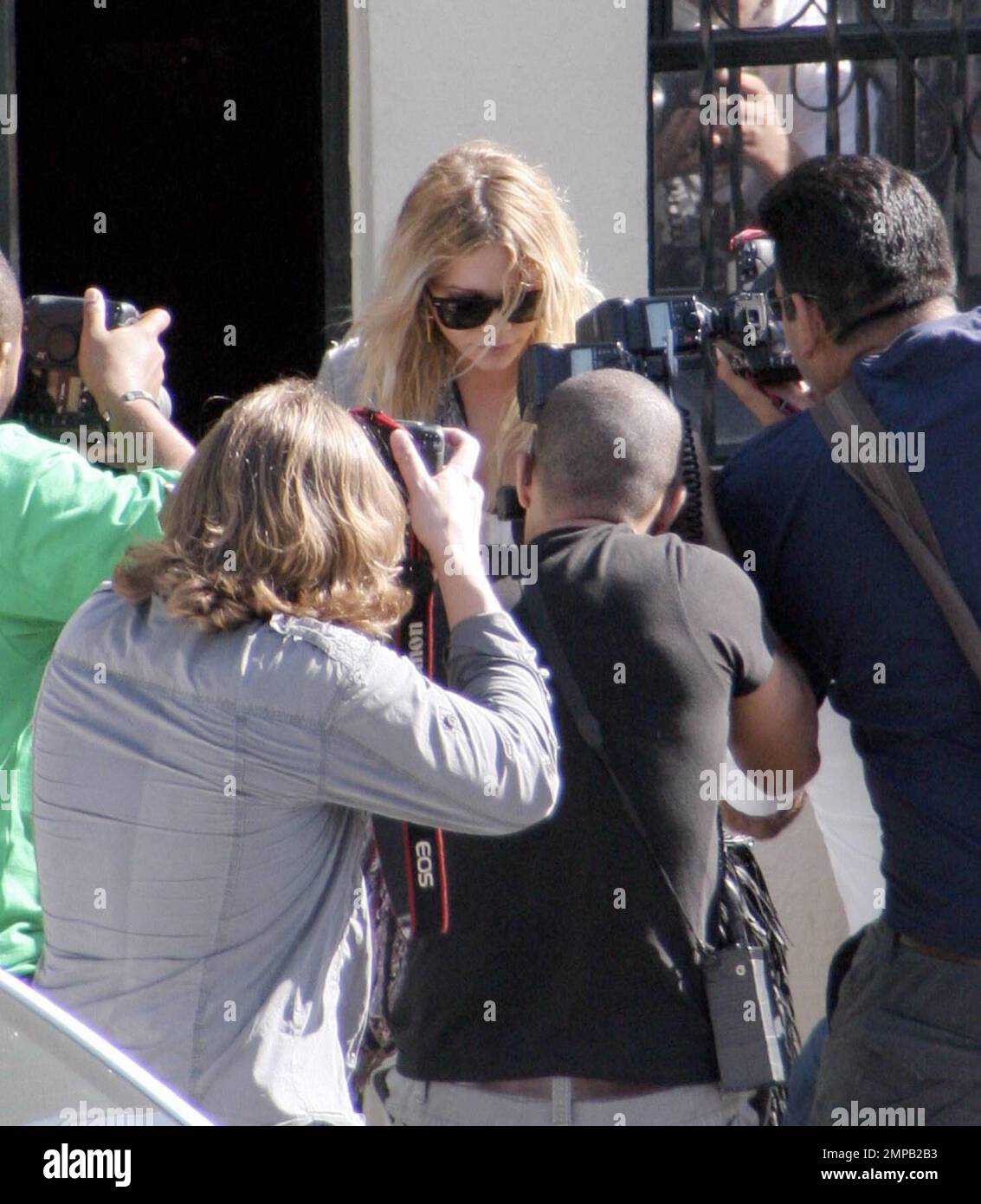 Ashley Olsen shops at the boutique store Tracey Ross wearing lots of ...