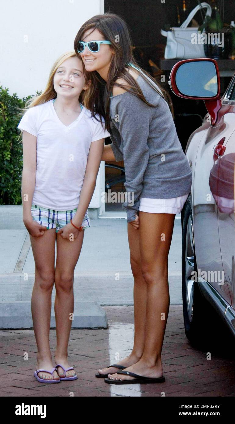 Disney star Ashley Tisdale keeps close to boyfriend Scott Speer while ...