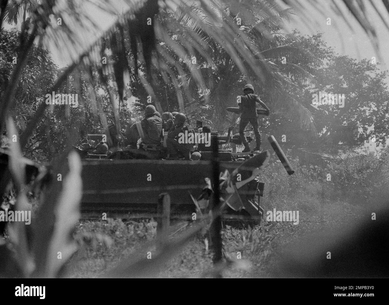 Government troops prepare to fire recoilless rifle at nearby North ...