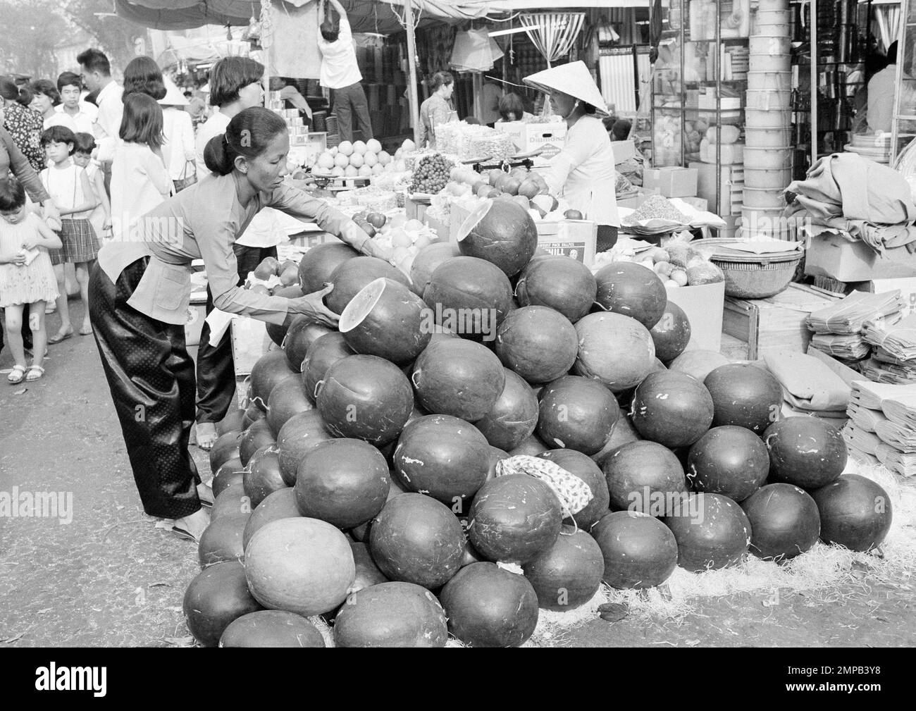 Mountains of watermelons have been built all over Saigon, as seen Jan ...