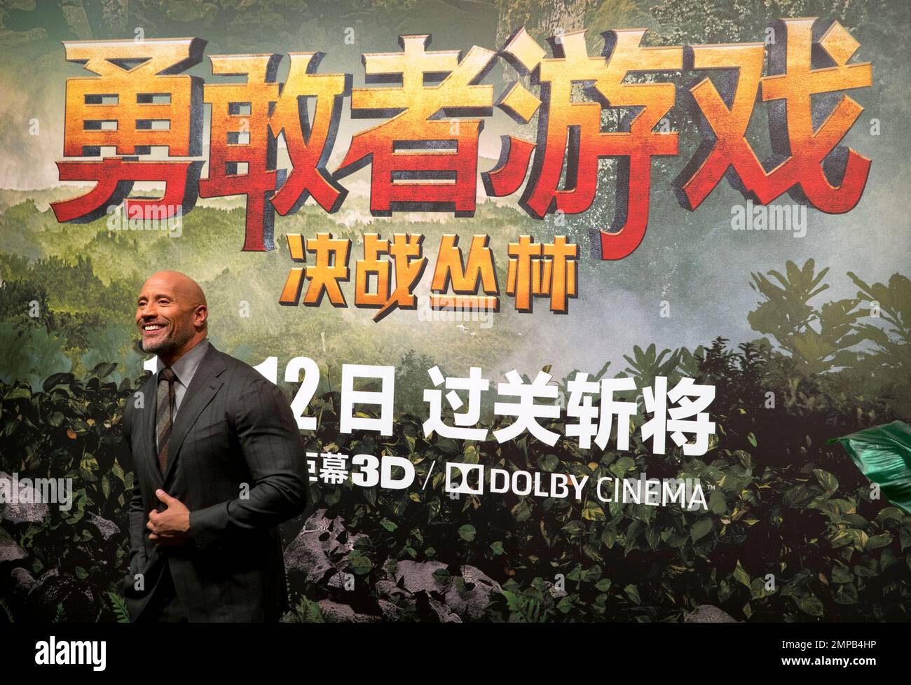 American actor Dwayne Johnson poses for photos on the red carpet before ...