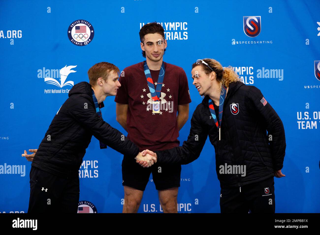 Second place finisher Ian Quinn, left, and third place finisher Jeffrey ...