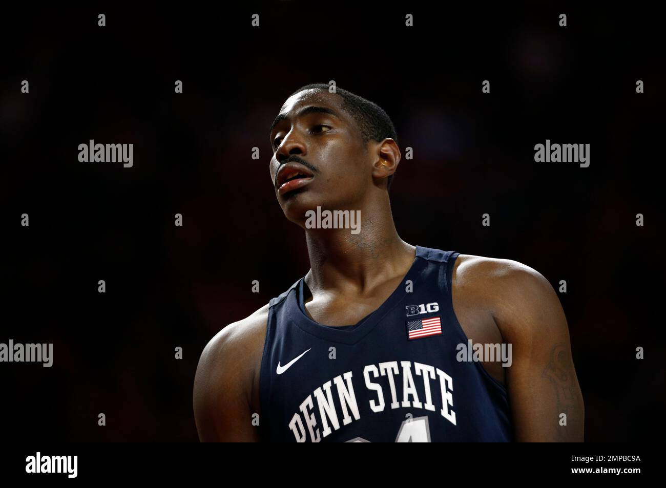 Penn State forward Mike Watkins stands on the court in the second half ...