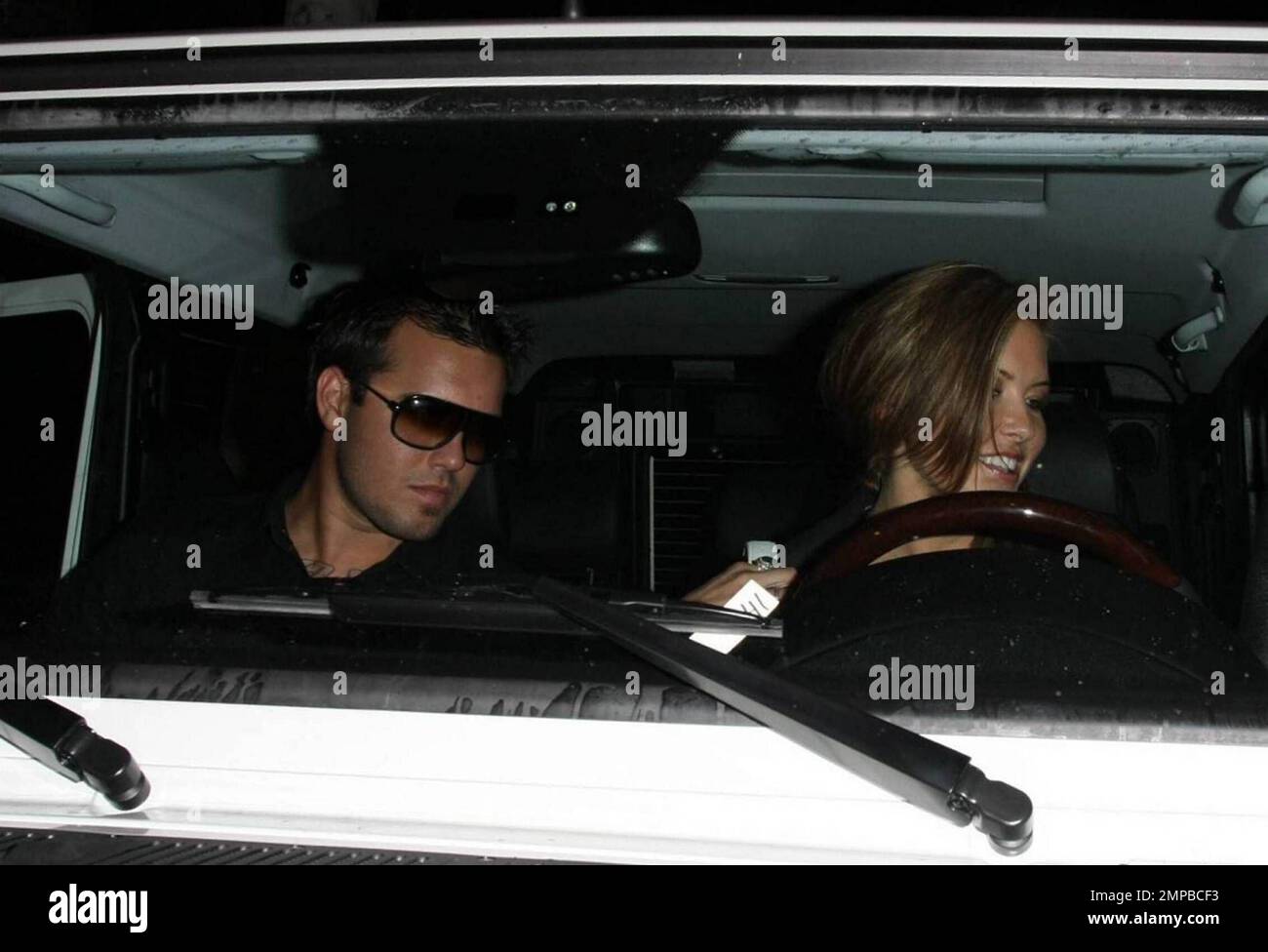 Audrina Patridge wears a little black satin short suit as she leaves ...