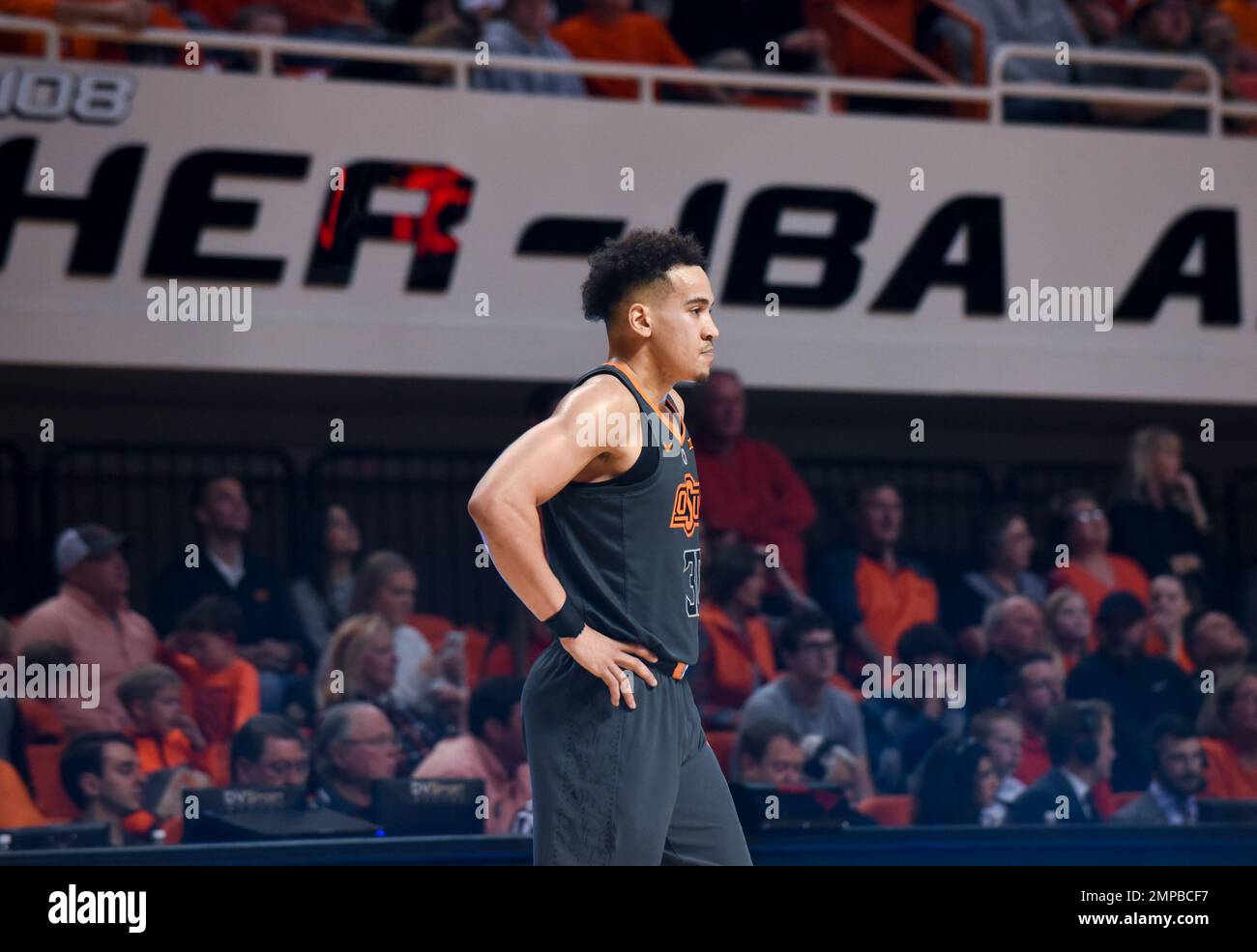 Oklahoma State guard Jeffrey Carroll looks to a teammate during a NCAA ...