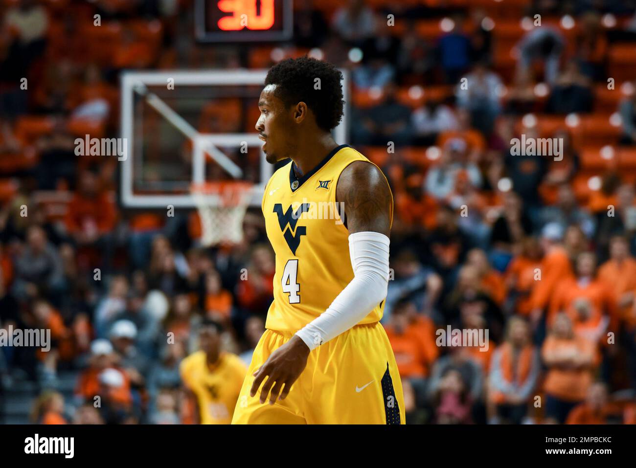 West Virginia guard Daxter Miles Jr. looks to the bench during a NCAA ...