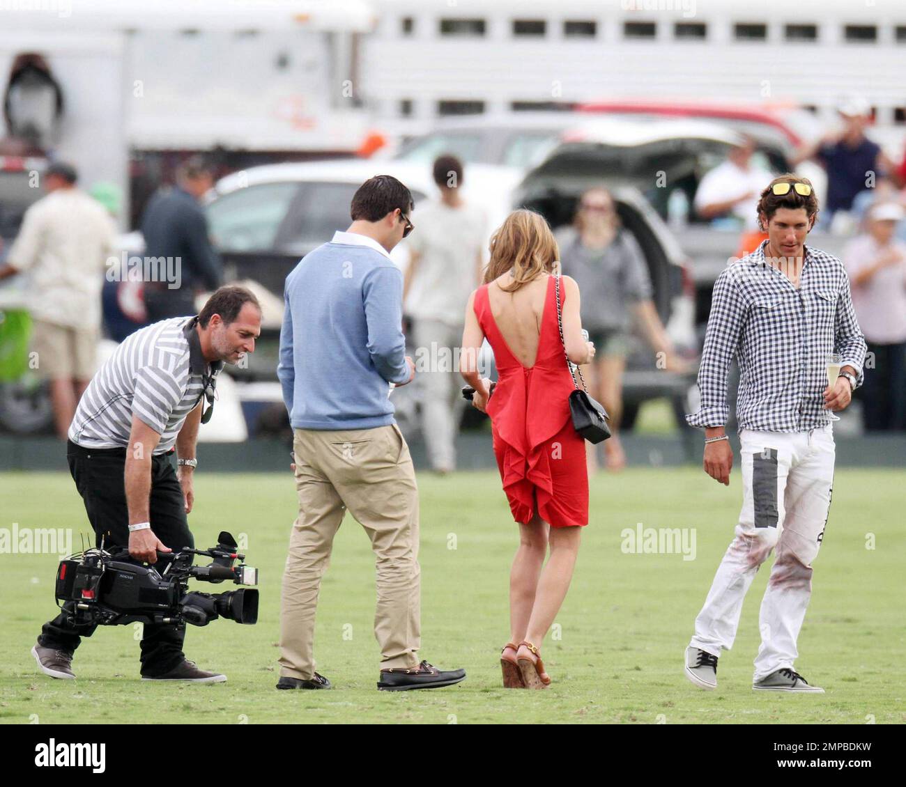 Looking very elegant in a red dress American television personality ...