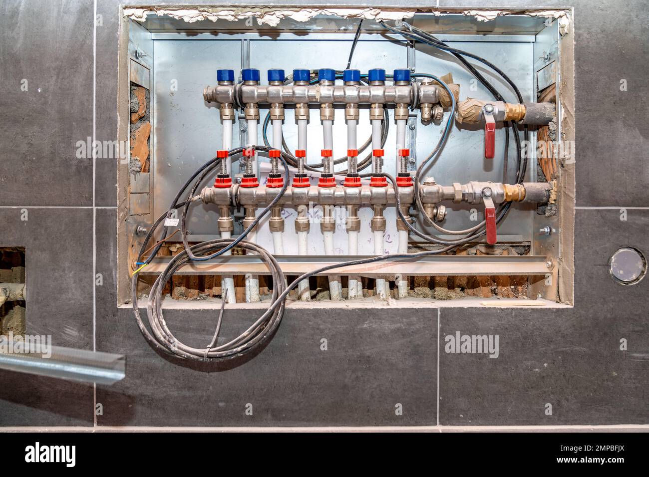 floor heating distribution box on the construction of the house Stock ...