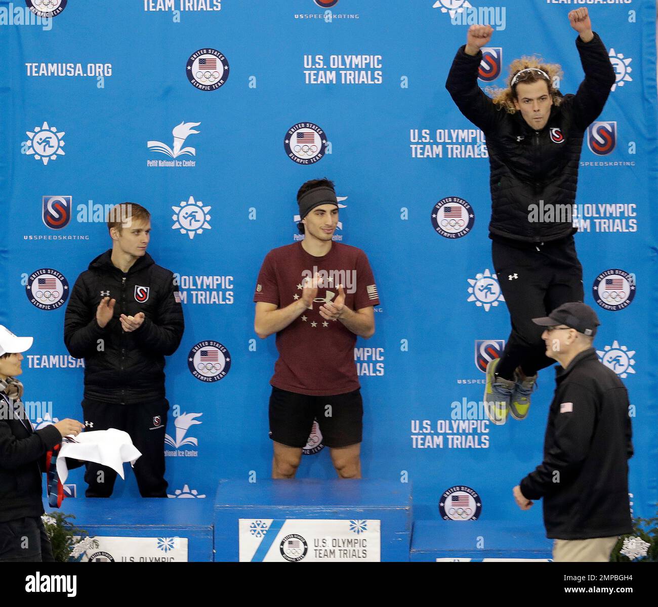Third place finisher Jeffrey Swider-Peltz, right, jumps up as first ...