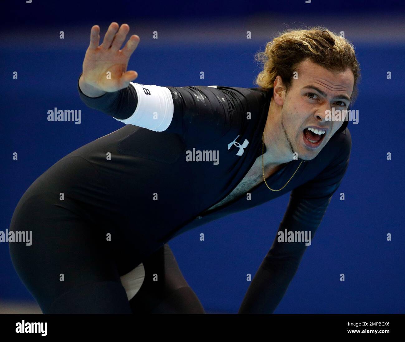 Jeffrey Swider-Peltz reacts after competing in the men's 5,000 meters ...