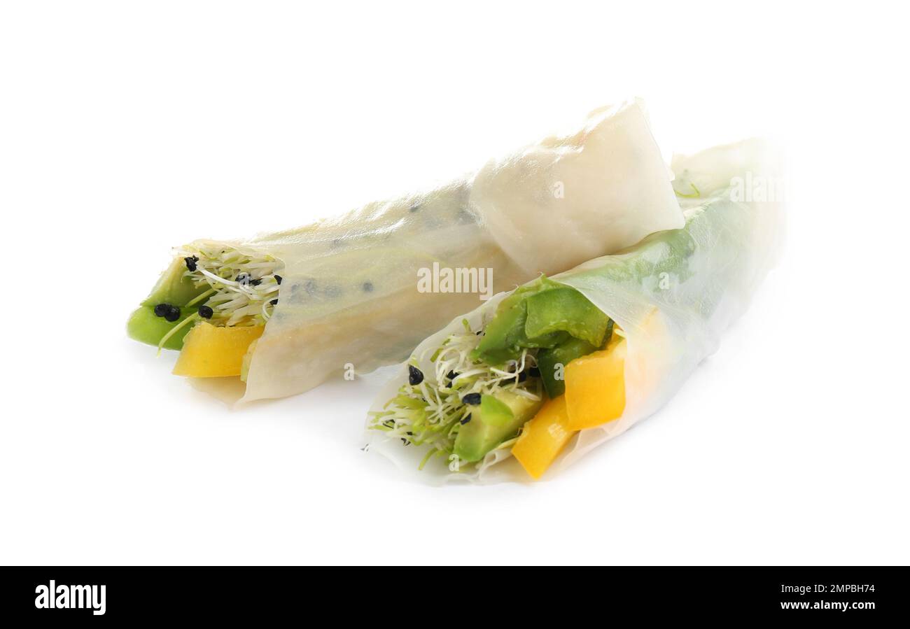 Delicious rolls wrapped in rice paper isolated on white Stock Photo - Alamy